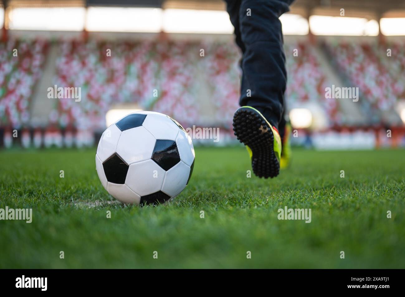 Soccer ball and legs of young player before kicking the ball Stock ...