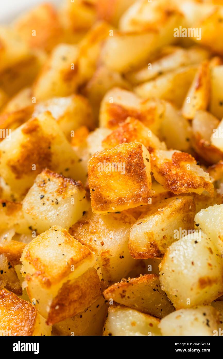 Homemade Fried Potato Hash Browns with Salt and Pepper Stock Photo - Alamy