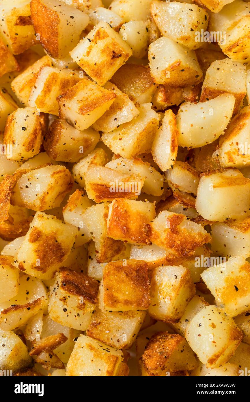 Homemade Fried Potato Hash Browns with Salt and Pepper Stock Photo - Alamy