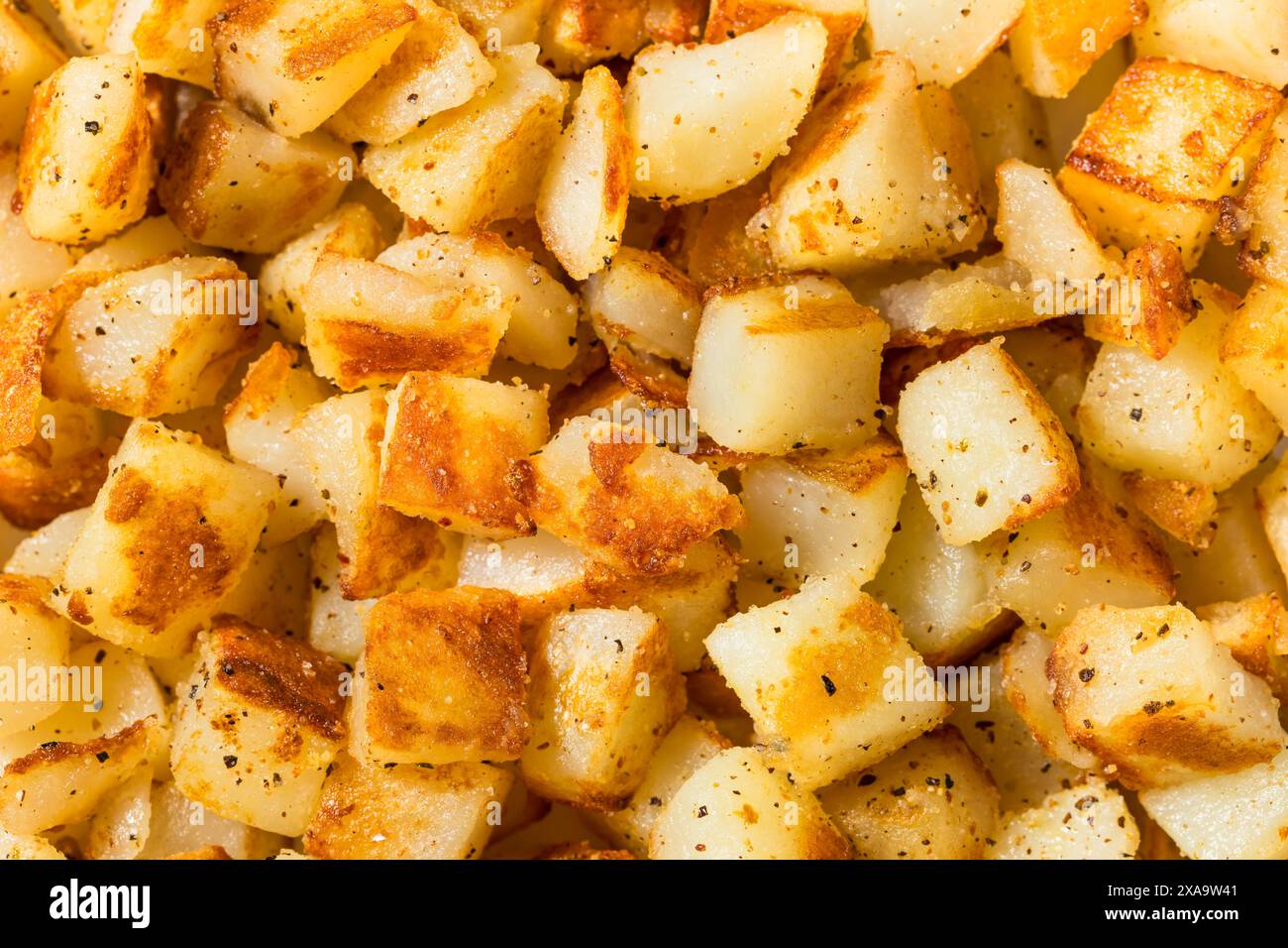 Homemade Fried Potato Hash Browns with Salt and Pepper Stock Photo - Alamy