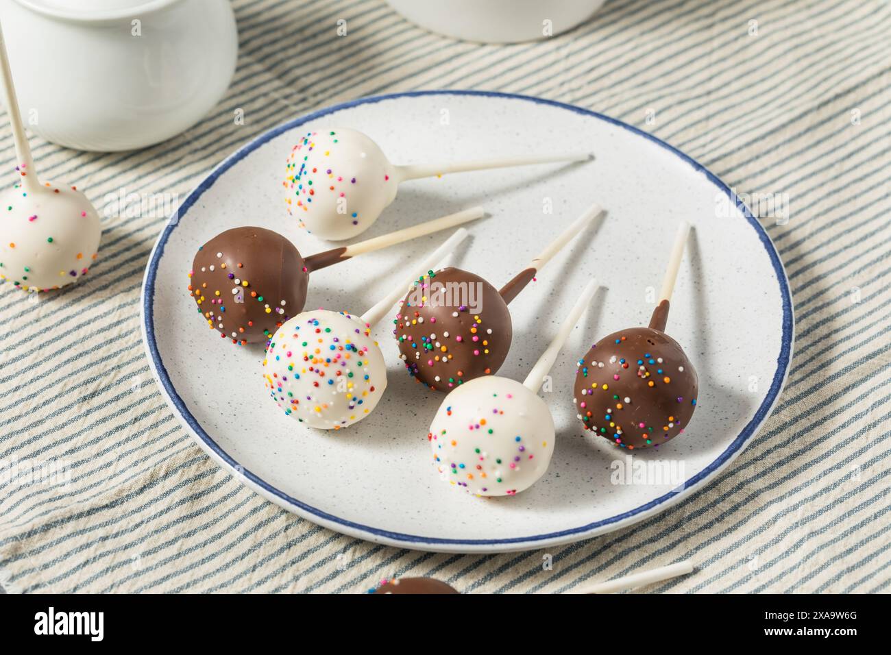 Homemade Vanilla and Chocolate Cake Pops with Sprinkles Stock Photo - Alamy