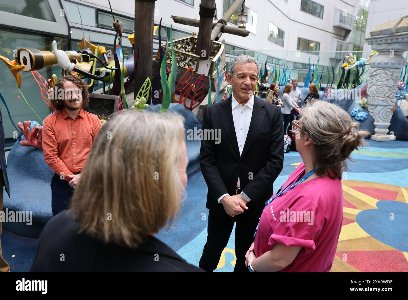 EDITORIAL USE ONLY CEO of The Walt Disney Company, Bob Iger (second ...