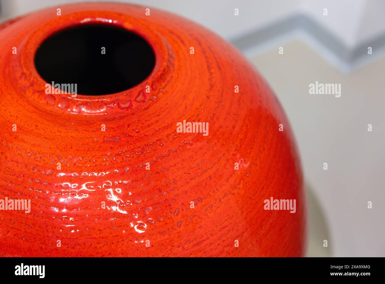 An empty round red vase, close up photo with selective soft focus Stock ...