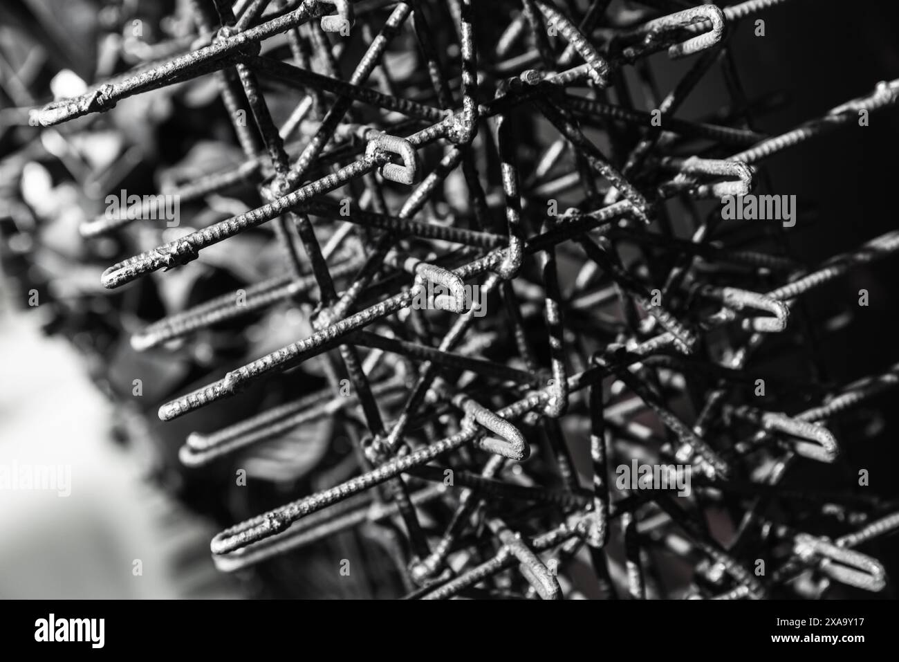 Abstract industrial background photo with dark steel reinforcement ...