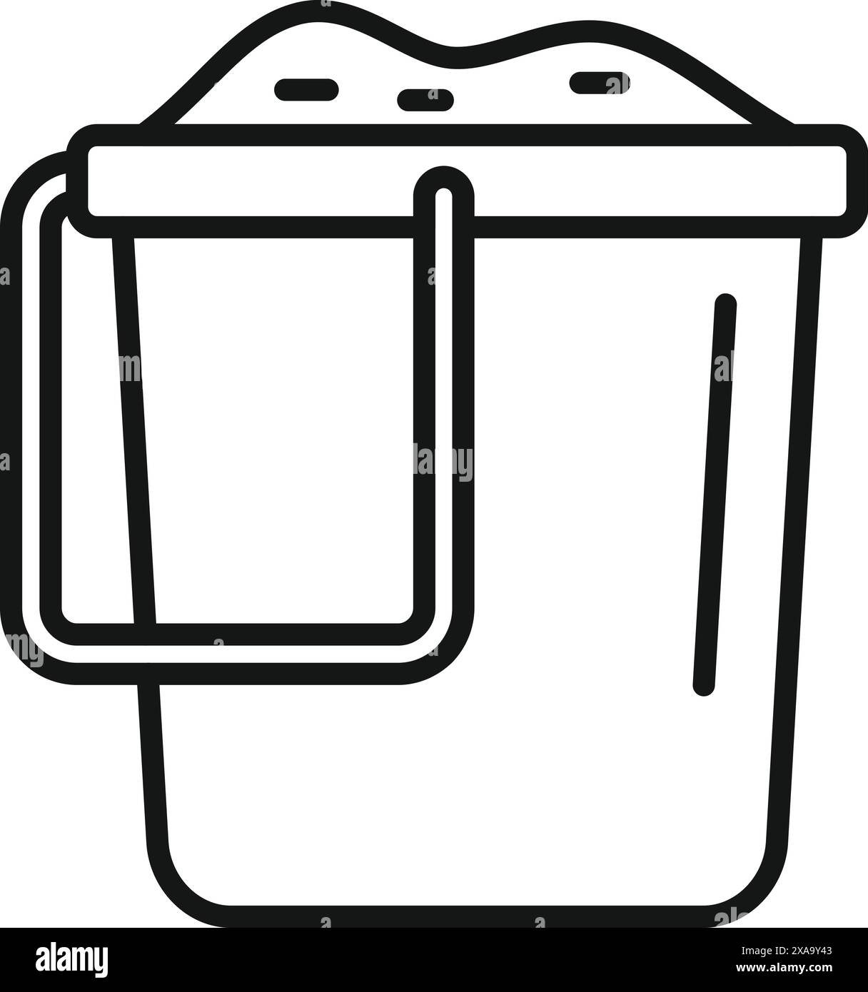 Simple bucket overflowing with sand, suggesting ongoing construction or ...