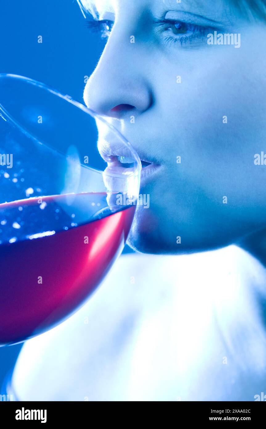 Woman drinking red wine (Model Release Stock Photo - Alamy