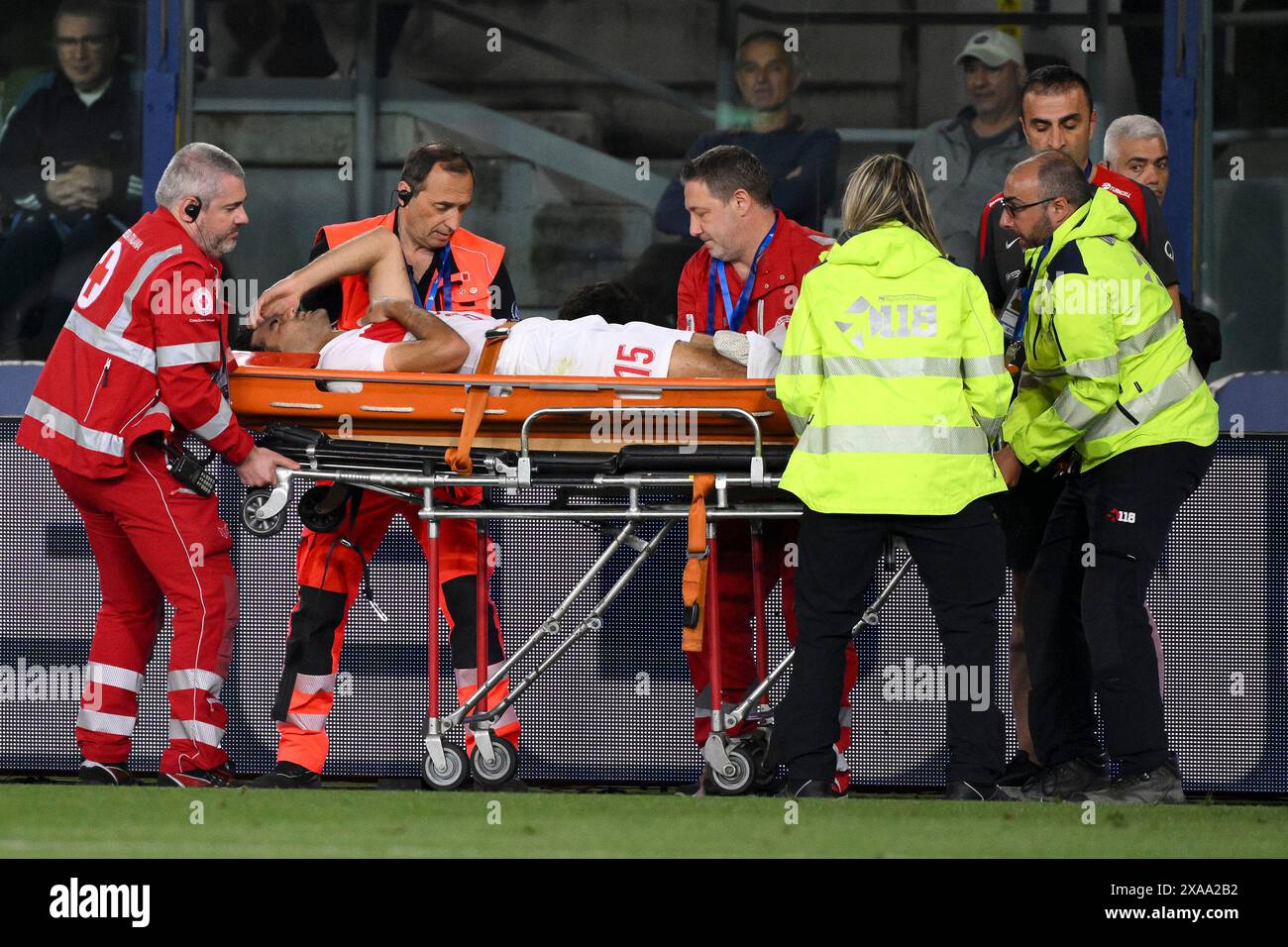 Ozan Kabak of Turkey leaves the pitch on a stretcher after his injury ...