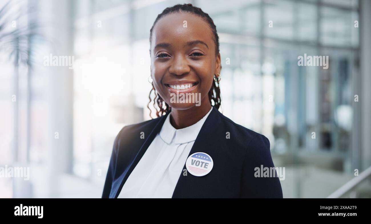 Black woman, smile and badge for vote in office in portrait with ...