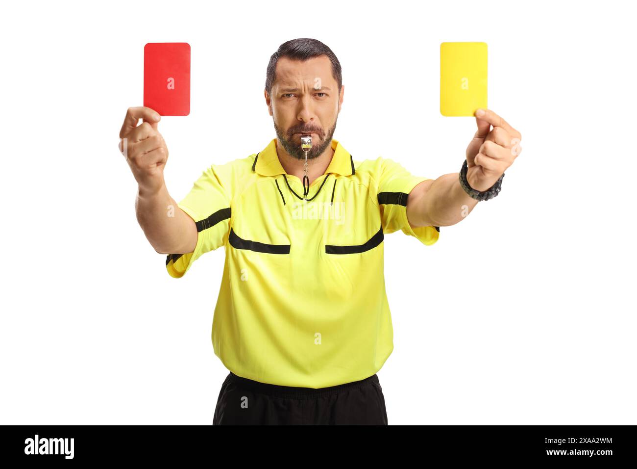 Football referee blowing a whistle and showing a red and yellow card ...