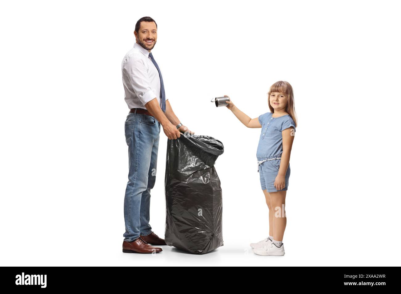 Girl throwing a tin can in a plastic bag held by a man isolated on ...