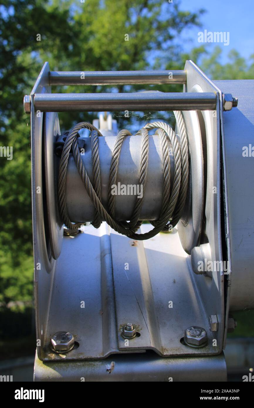 Wire rope from a winch is wound up in a mess Stock Photo - Alamy