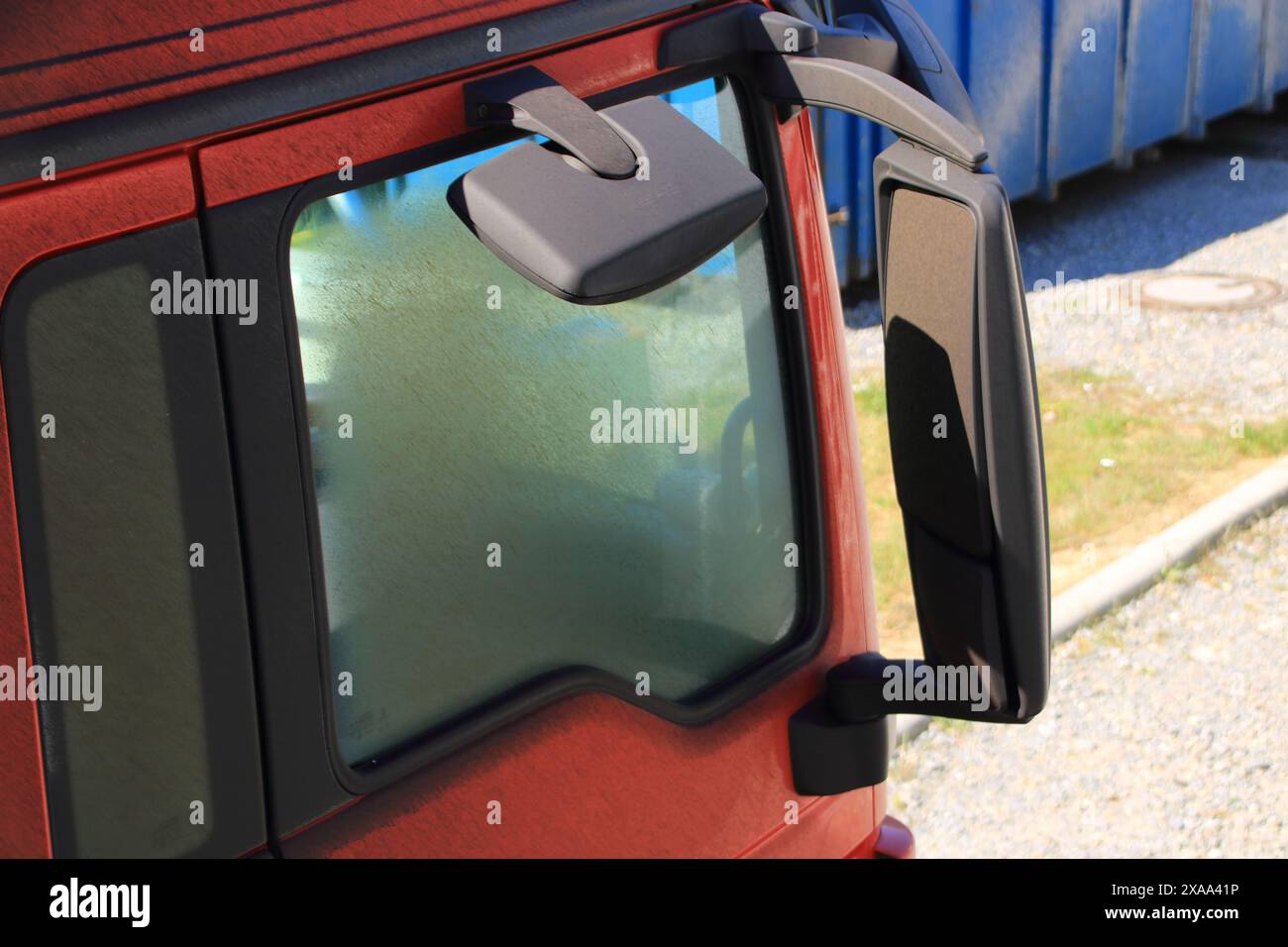 The side windows and mirrors of a truck are heavily dirty Stock Photo ...