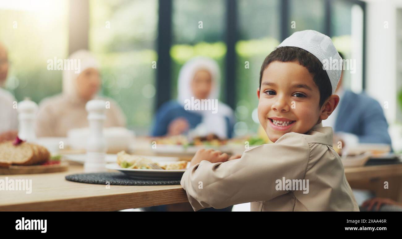 Children, eid and portrait of muslim boy eating food with family in ...