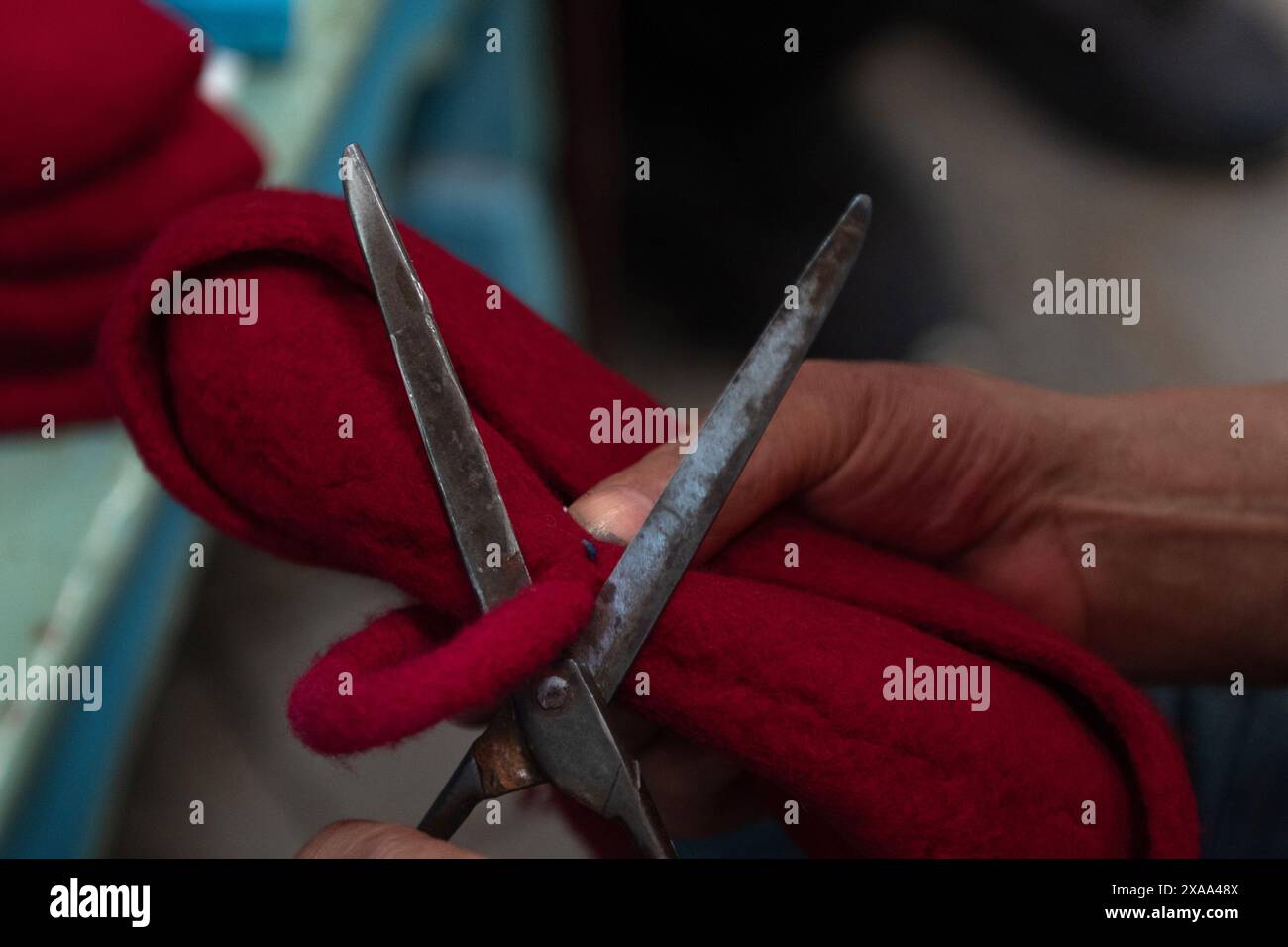 Tunis, Tunisia 22nd May, 2024 A Tunisian artisan puts the finishing ...