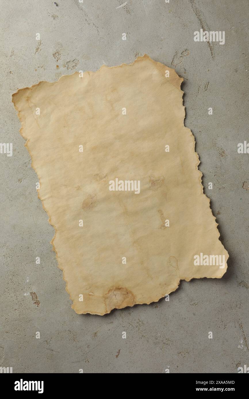 Sheet of old parchment paper on grey table, top view Stock Photo - Alamy