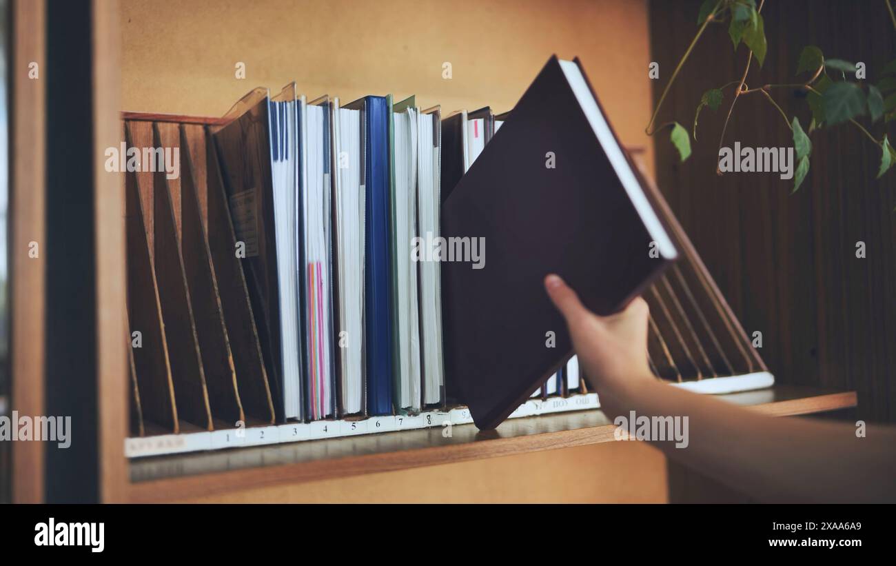 The teacher takes a school teacher's magazine from the shelf. Class ...