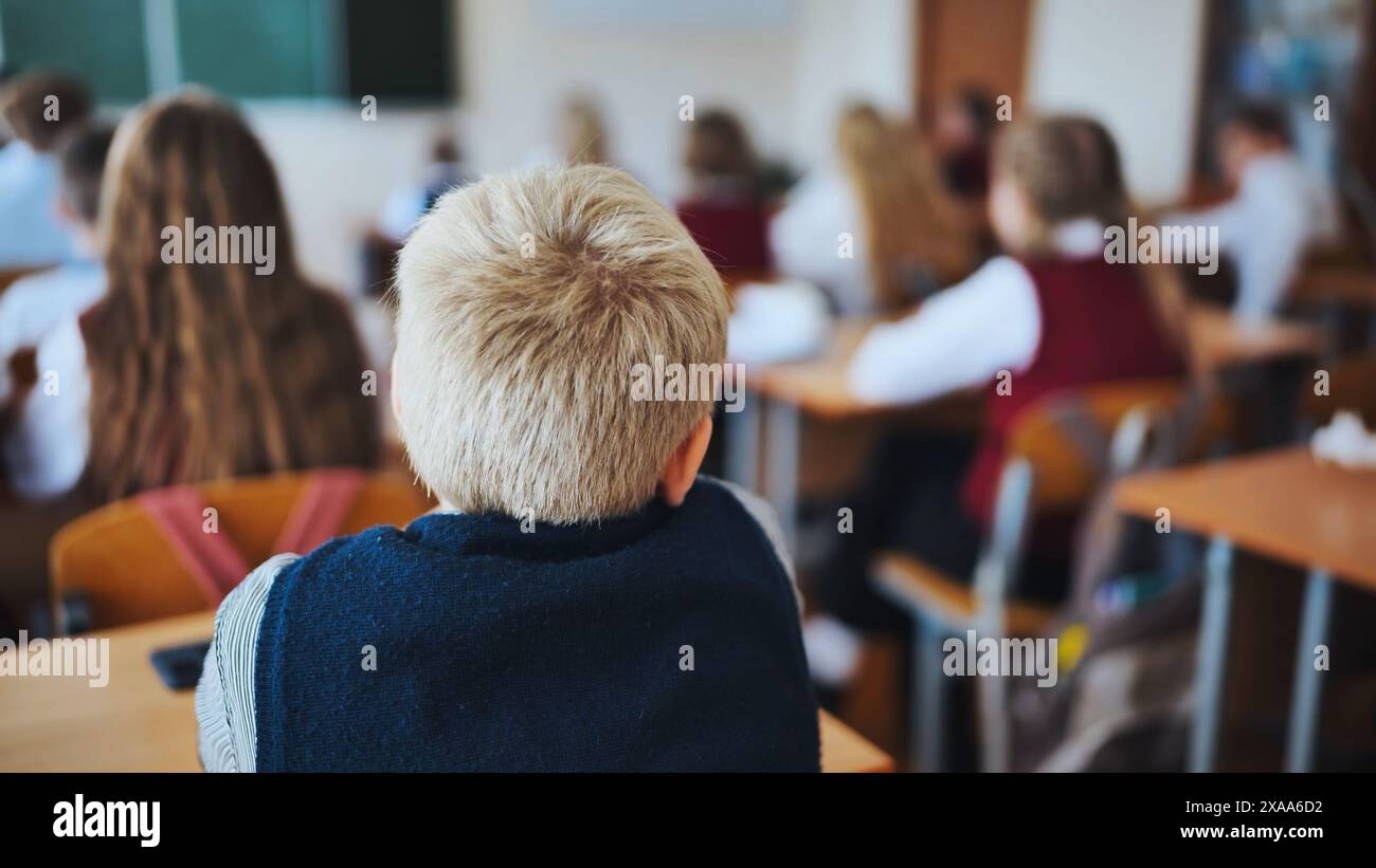 A junior high school class in a middle school. Back view Stock Photo ...