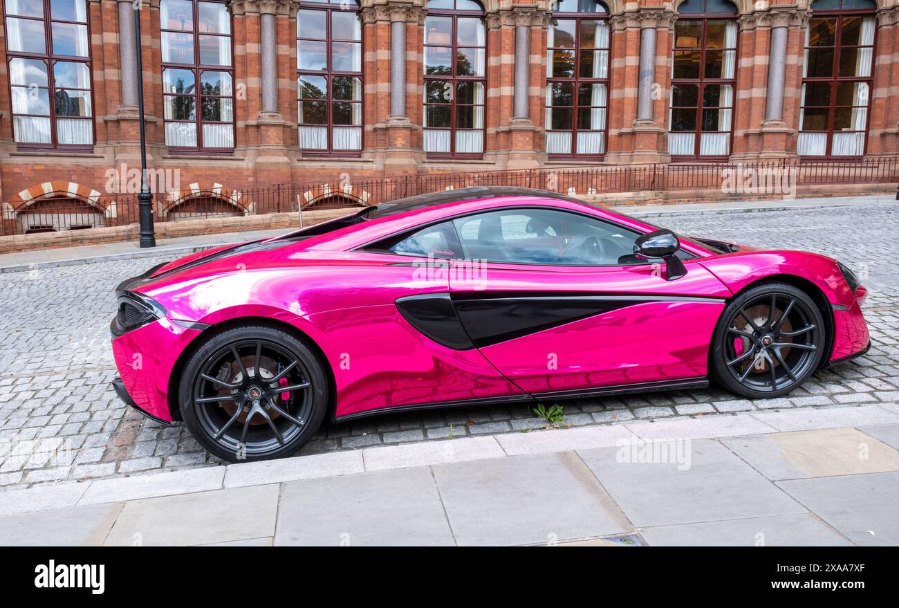 A pink McLaren 570S car parked on the street in London, UK Stock Photo ...
