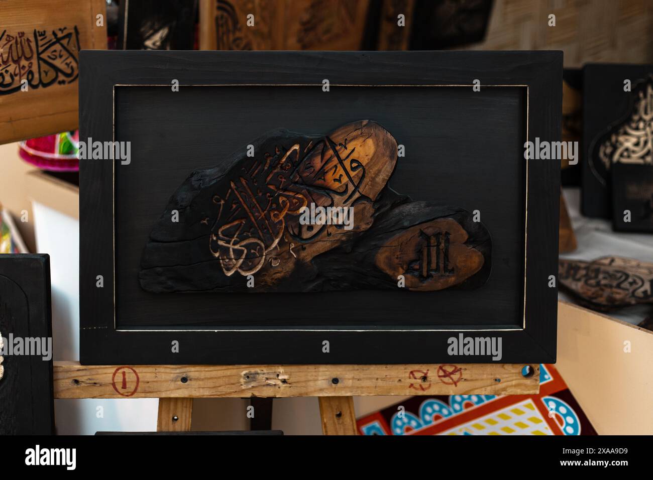 A carved wooden artwork at Lok Mela in Islamabad, Pakistan Stock Photo ...