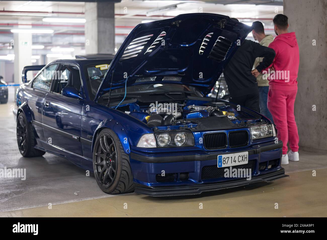 Front view of a blue BMW E36 with the hood open showing engine Stock ...