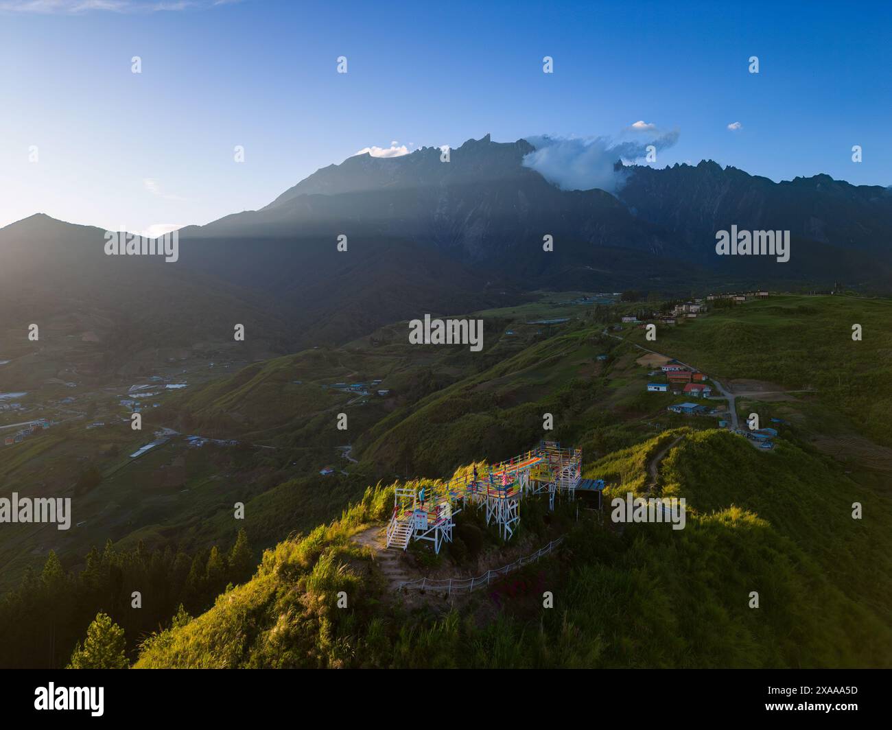 Sun low in the sky, illuminating the scene in golden light Stock Photo ...