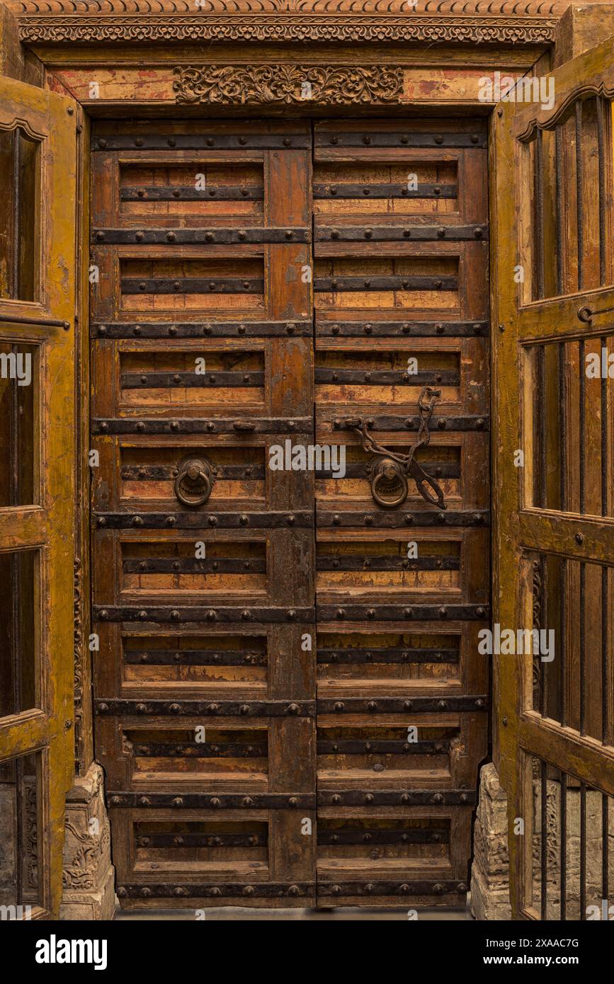 A detailed view of an open old wooden door Stock Photo - Alamy