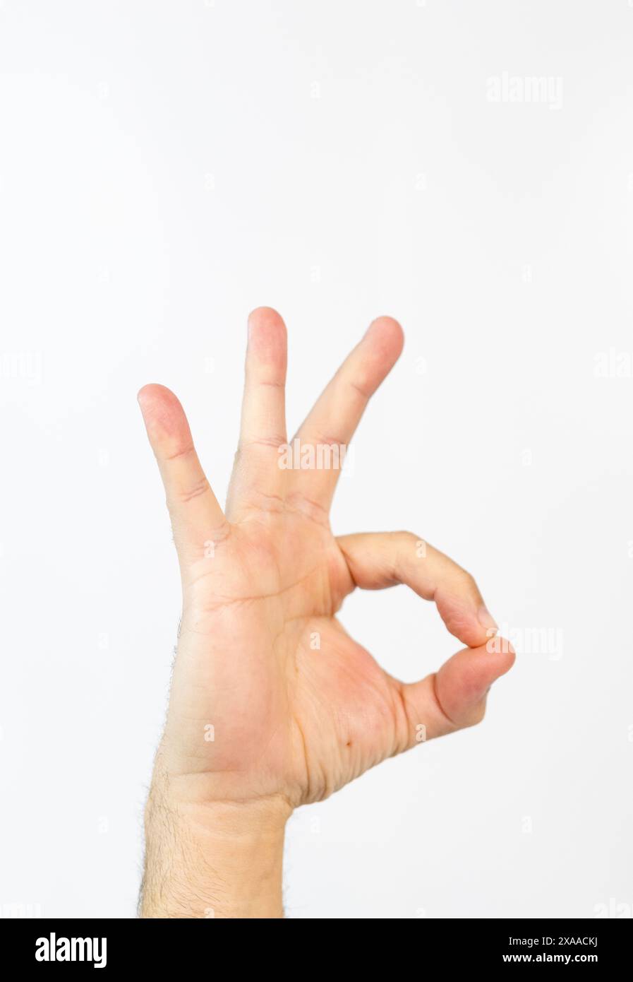 Hands Making the OK Sign Gesture Stock Photo - Alamy