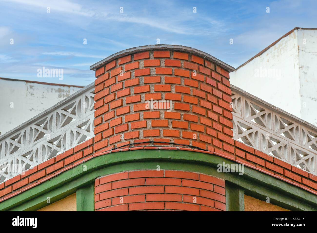 View of the well-preserved chamfered corner of a house, Puertollano ...
