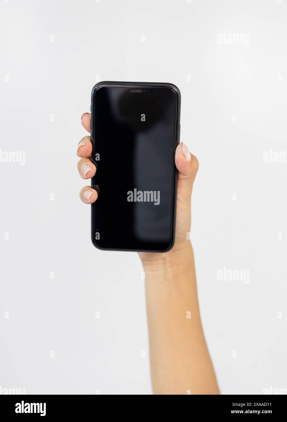 Hands Holding a Smartphone in a Detailed Close-up Shot Stock Photo - Alamy