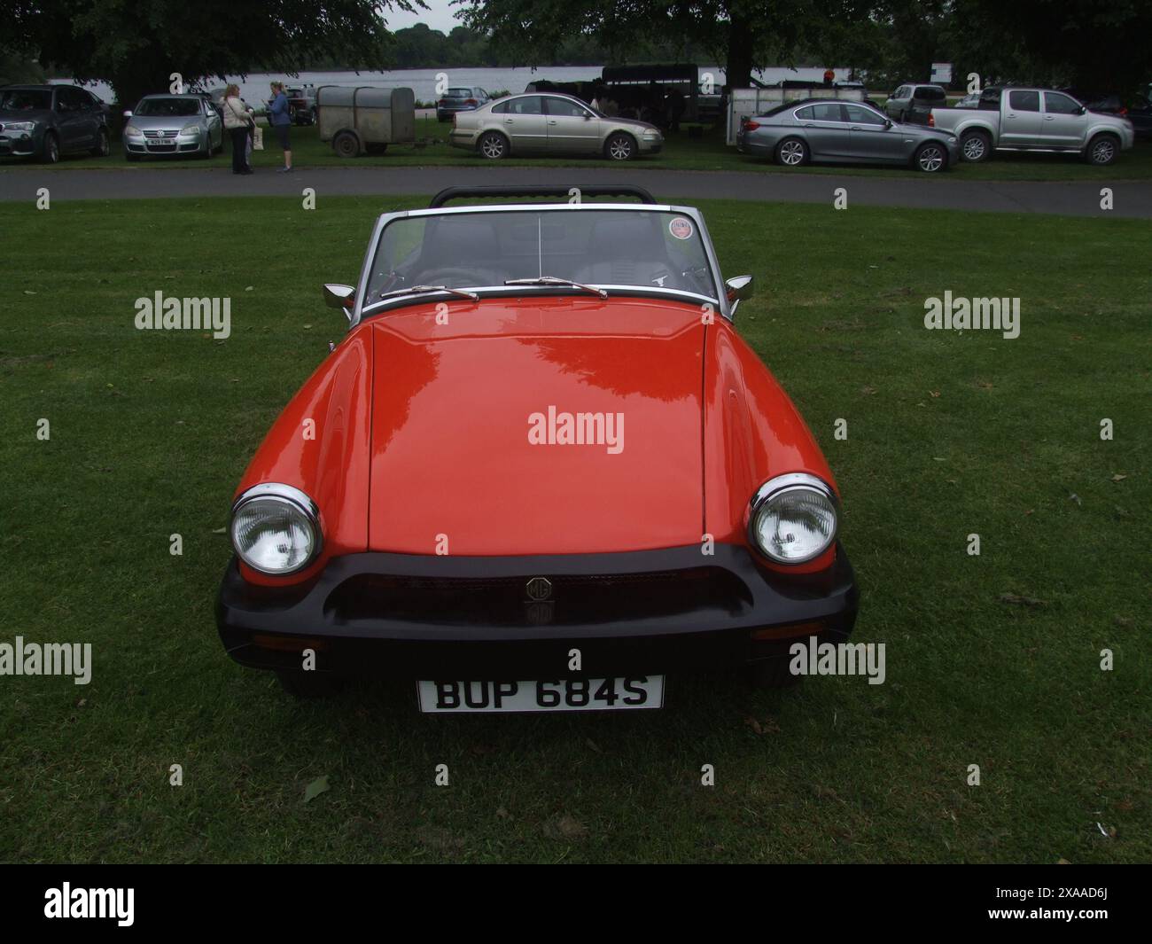 MG Midget 1500 Convertible in bright orange. Front View Stock Photo - Alamy