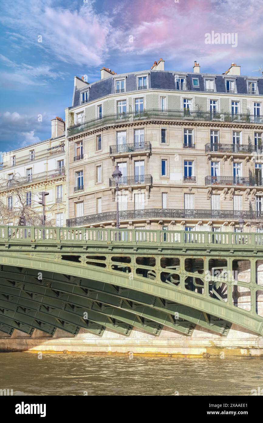 A scenic view of Saint-Louis island and beautiful Sully bridge in Paris ...