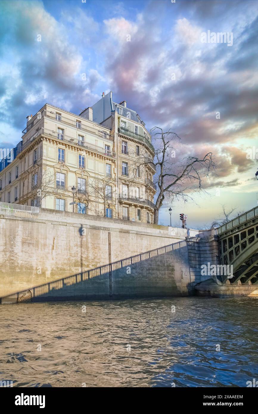 A scenic view of Saint-Louis island and beautiful Sully bridge in Paris ...