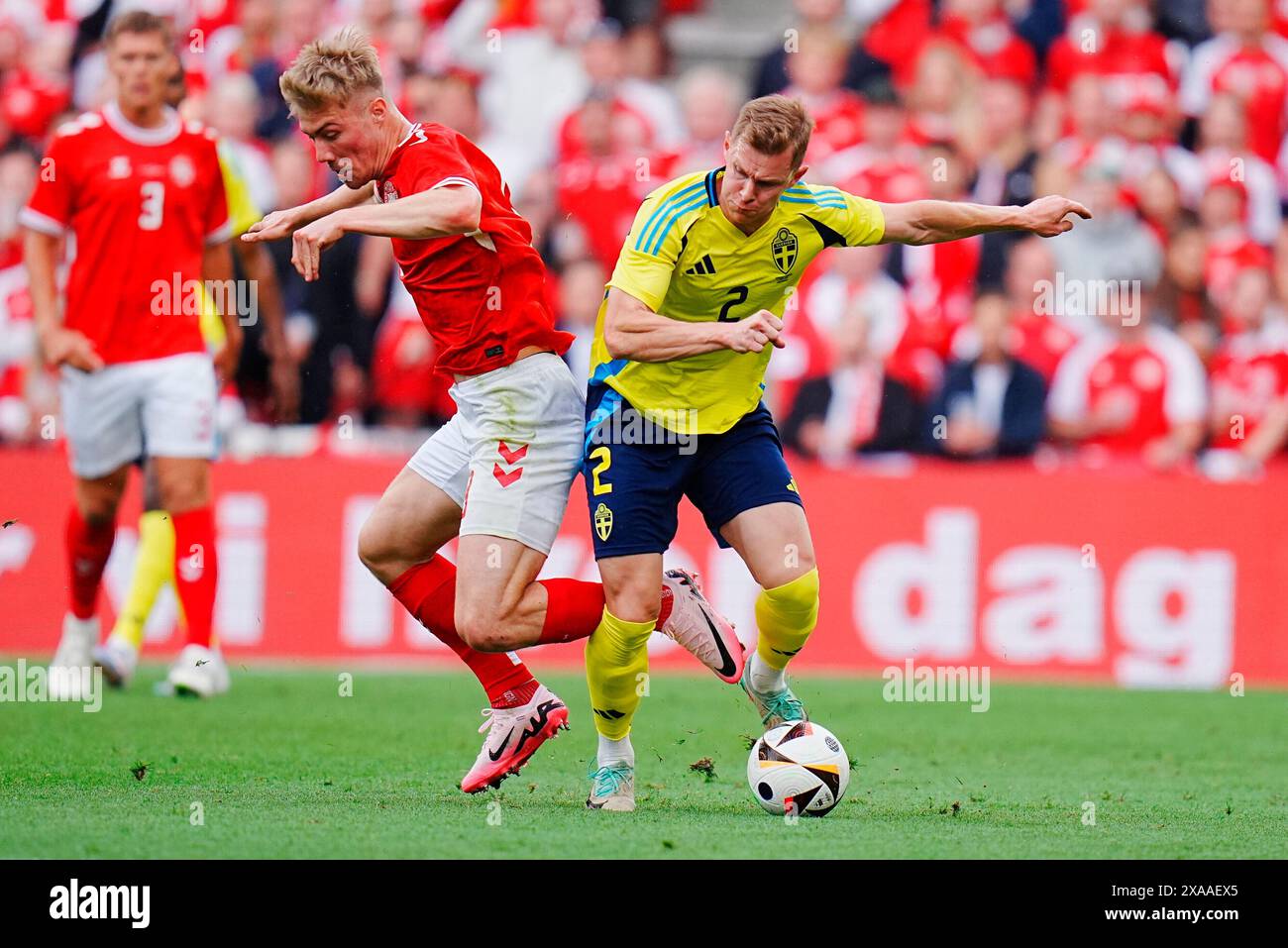 Sweden's Emil Krafth, right and, Denmark's Rasmus Hoejlund, left ...