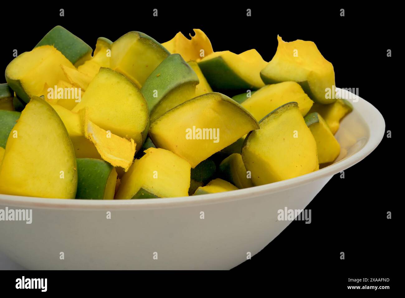Side View Of Slices of Mango for Mango Pickle In White Bowl, Isolated ...