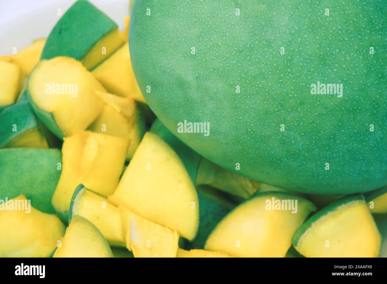 Very Close-Up View Of Slices of Mango with one Big Mango for Mango ...