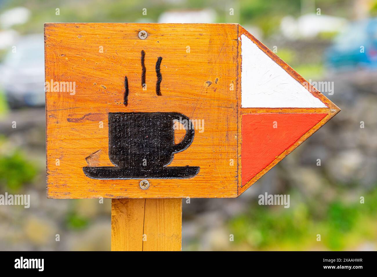 Wooden direction indicator with a key design for commercial cafe ...
