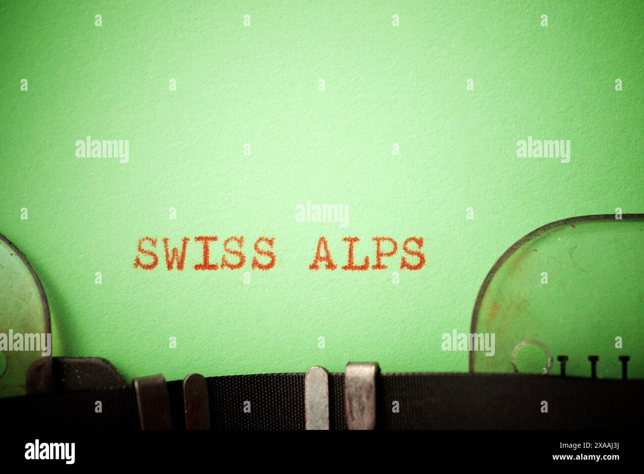 Swiss alps text written with a typewriter Stock Photo - Alamy