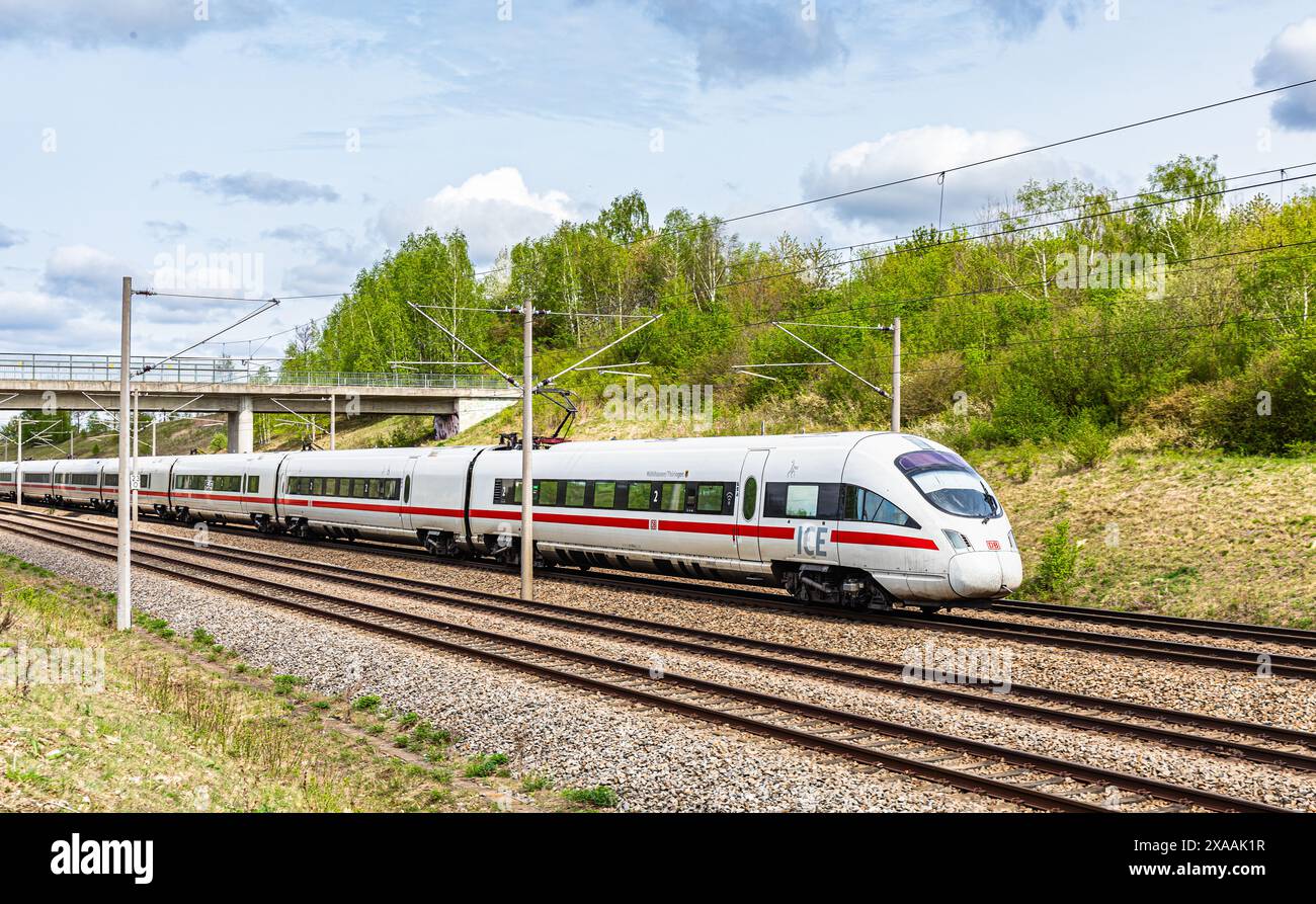 Hebertshausen, Germany, 10th Apr 2024: An ICE 3 (DB series 403) from Deutsche Bahn on the train ...