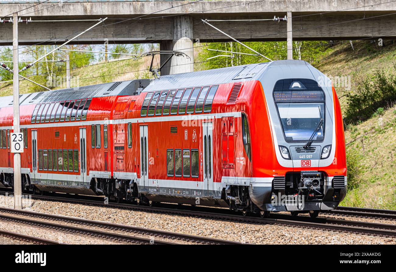 Hebertshausen, Germany, 10th Apr 2024: The Munich-Nuremberg Express runs with a DB series 445 ...