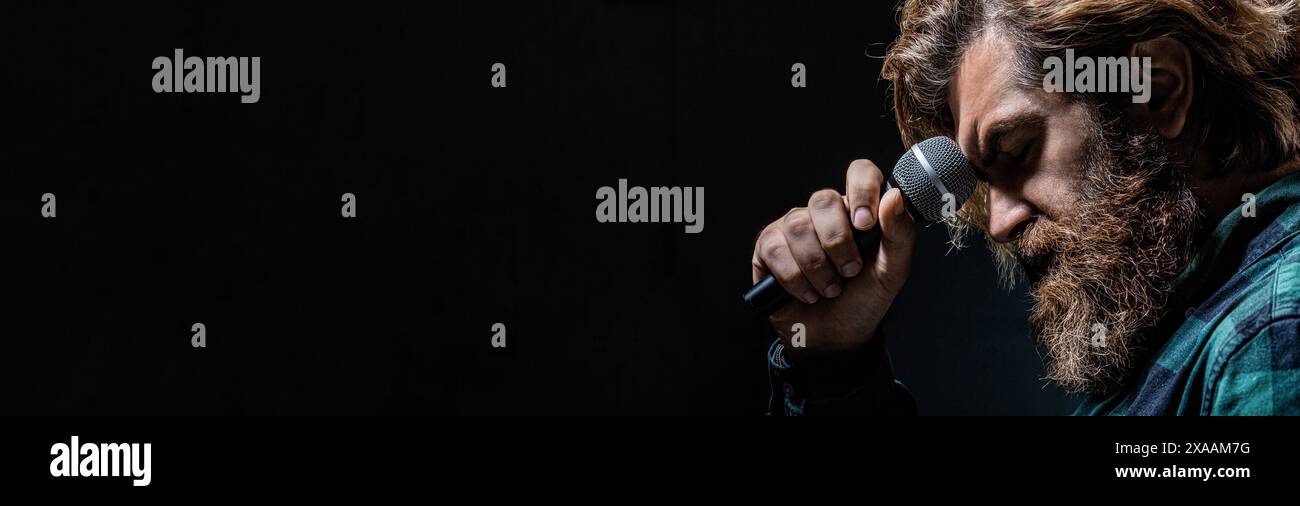 Bearded man singing microphone hi-res stock photography and images - Alamy