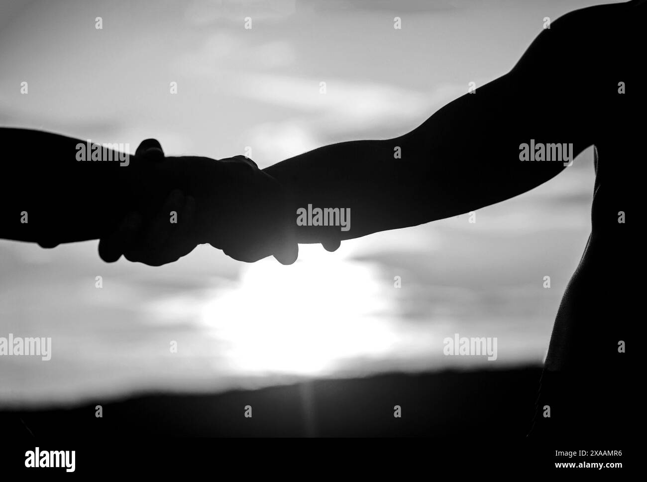 Outstretched hands, salvation, help silhouette, concept help. Giving a helping hand. Rescue ...