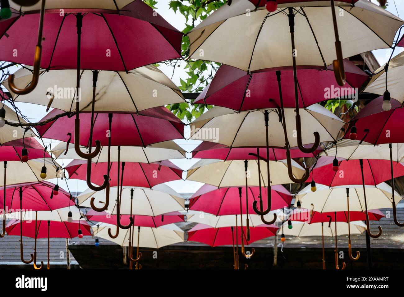 Outdoor hanging umbrellas installation hi-res stock photography and ...