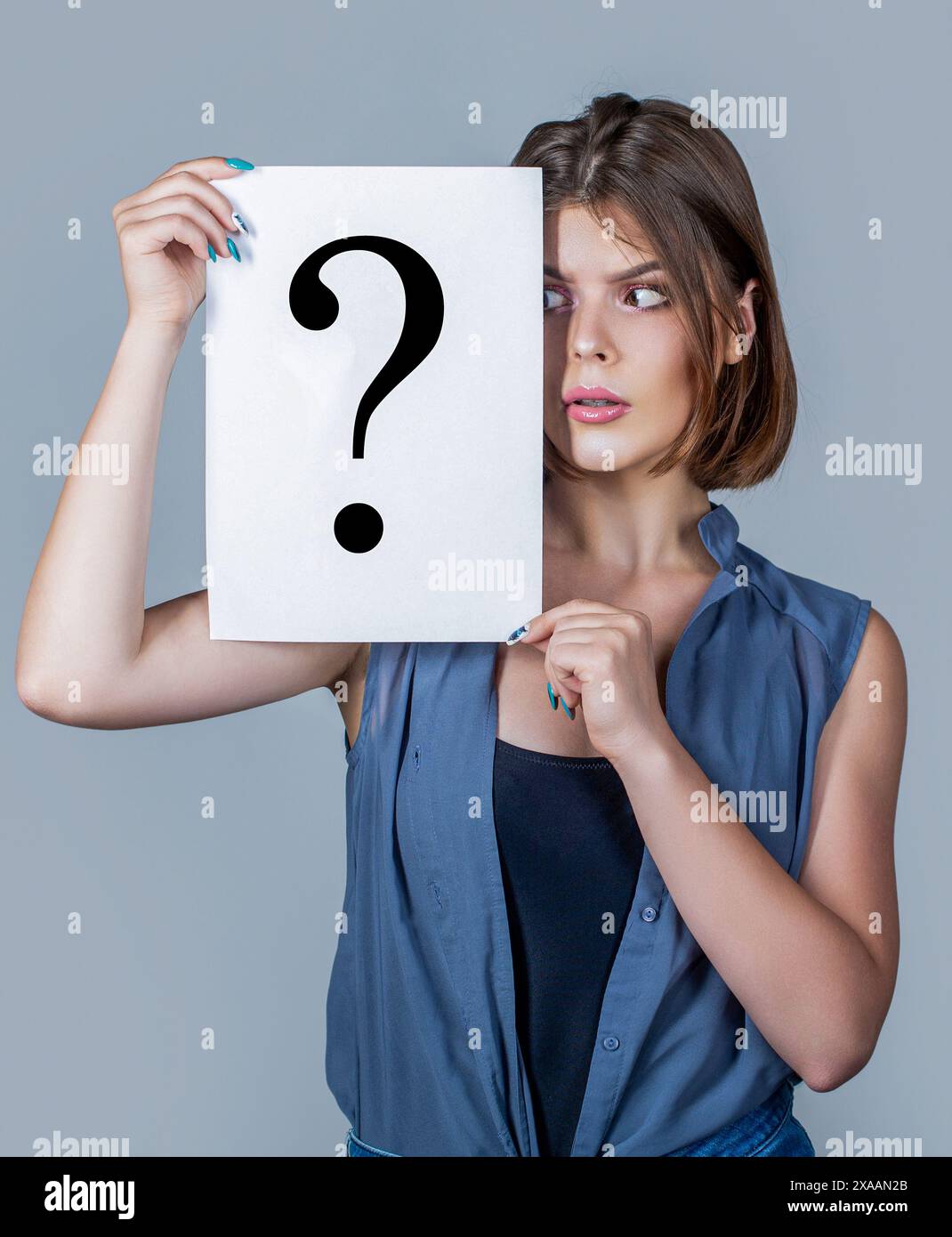 Girl holding paper question mark. Anonymous woman. Doubtful girl asking ...