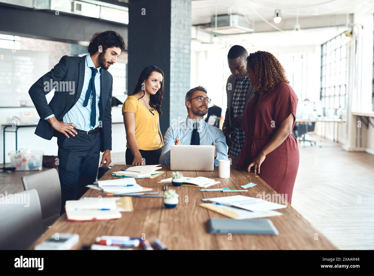 Business people, workshop and conversation with laptop together for ...