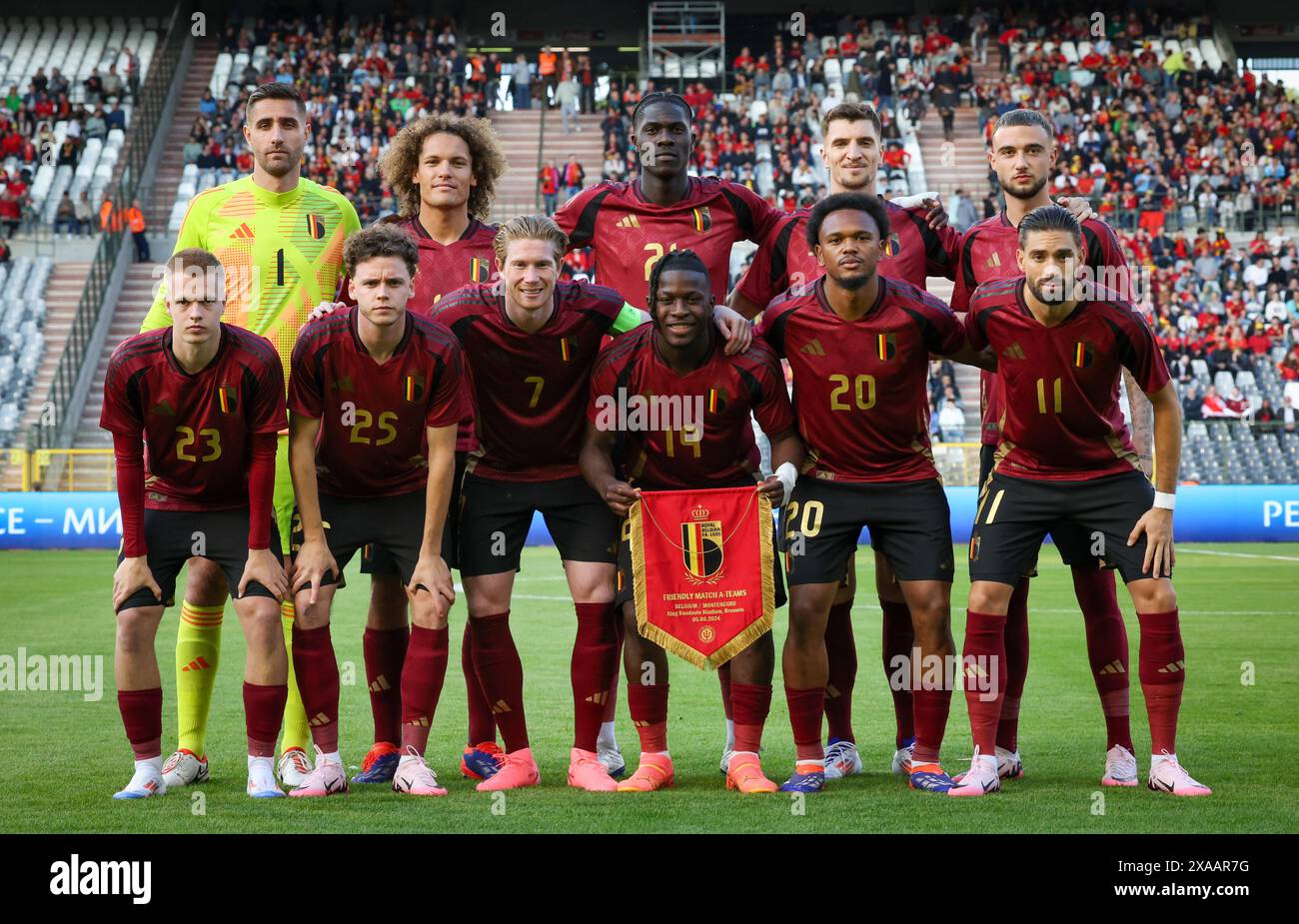 Belgium's goalkeeper Koen Casteels, Belgium's Wout Faes, Belgium's ...