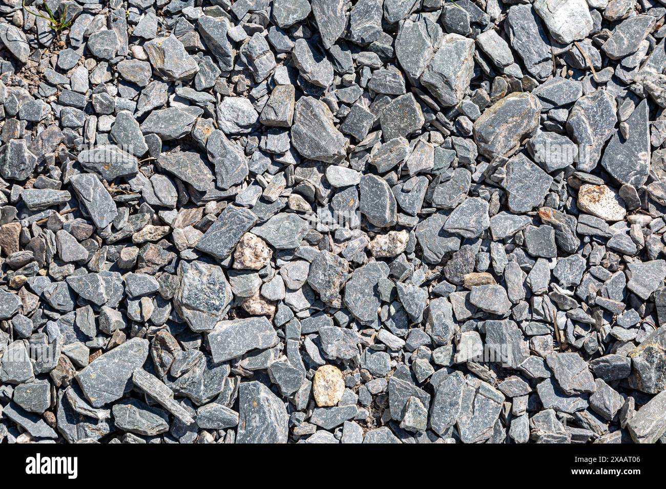 A full frame photograph of slate chippings in the sunshine Stock Photo ...