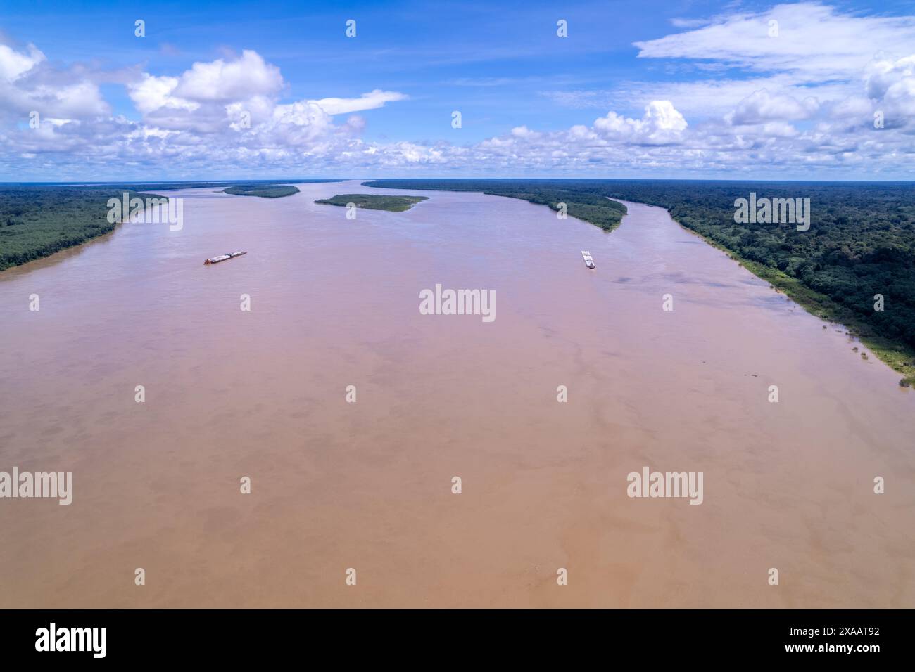 Beautiful aerial view of ferry boats carrying cargo across the Madeira ...