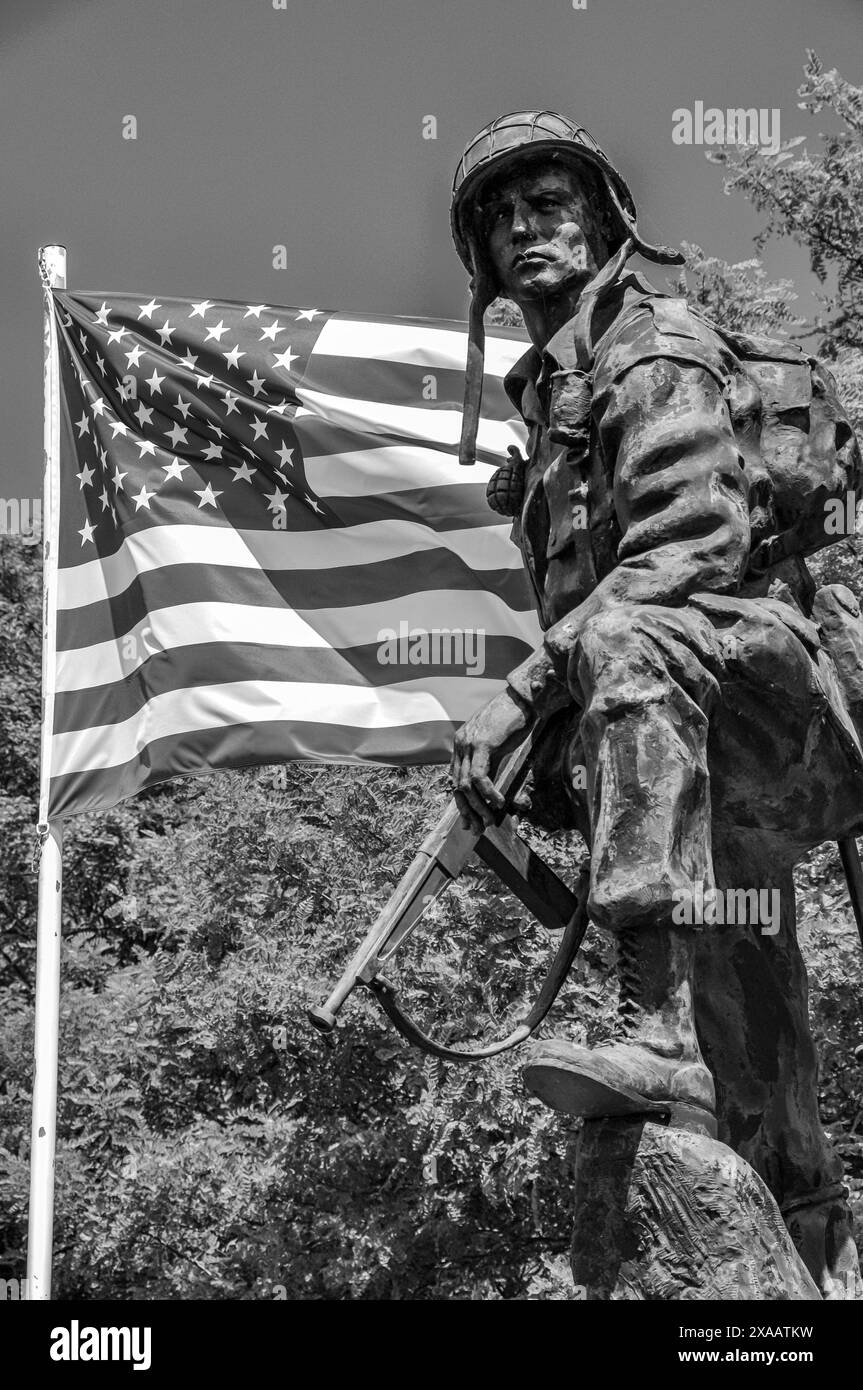 The image is of memorial statue in Normandy of Iron Mike who is the ...
