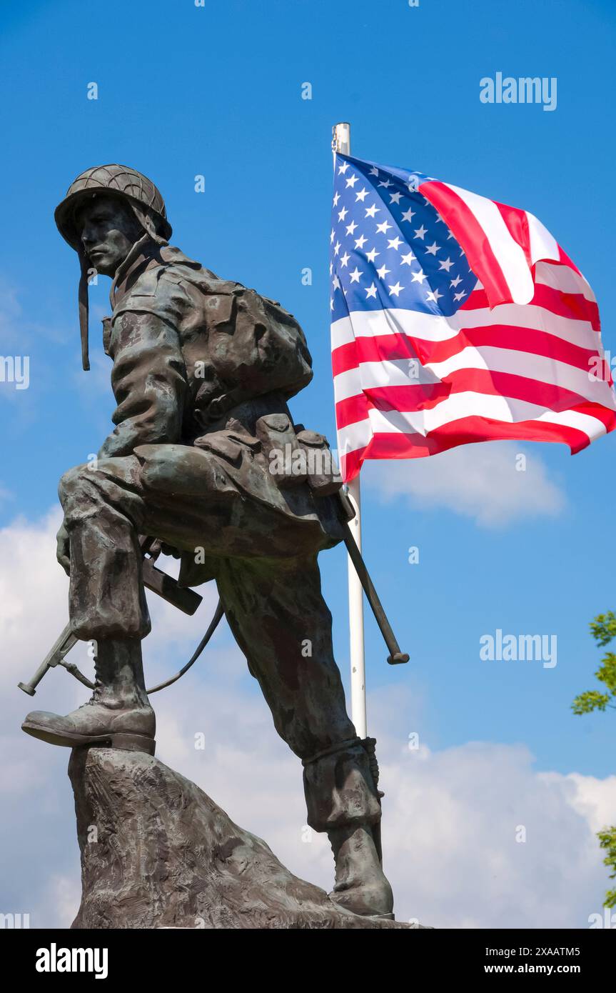 The image is of memorial statue in Normandy of Iron Mike who is the ...