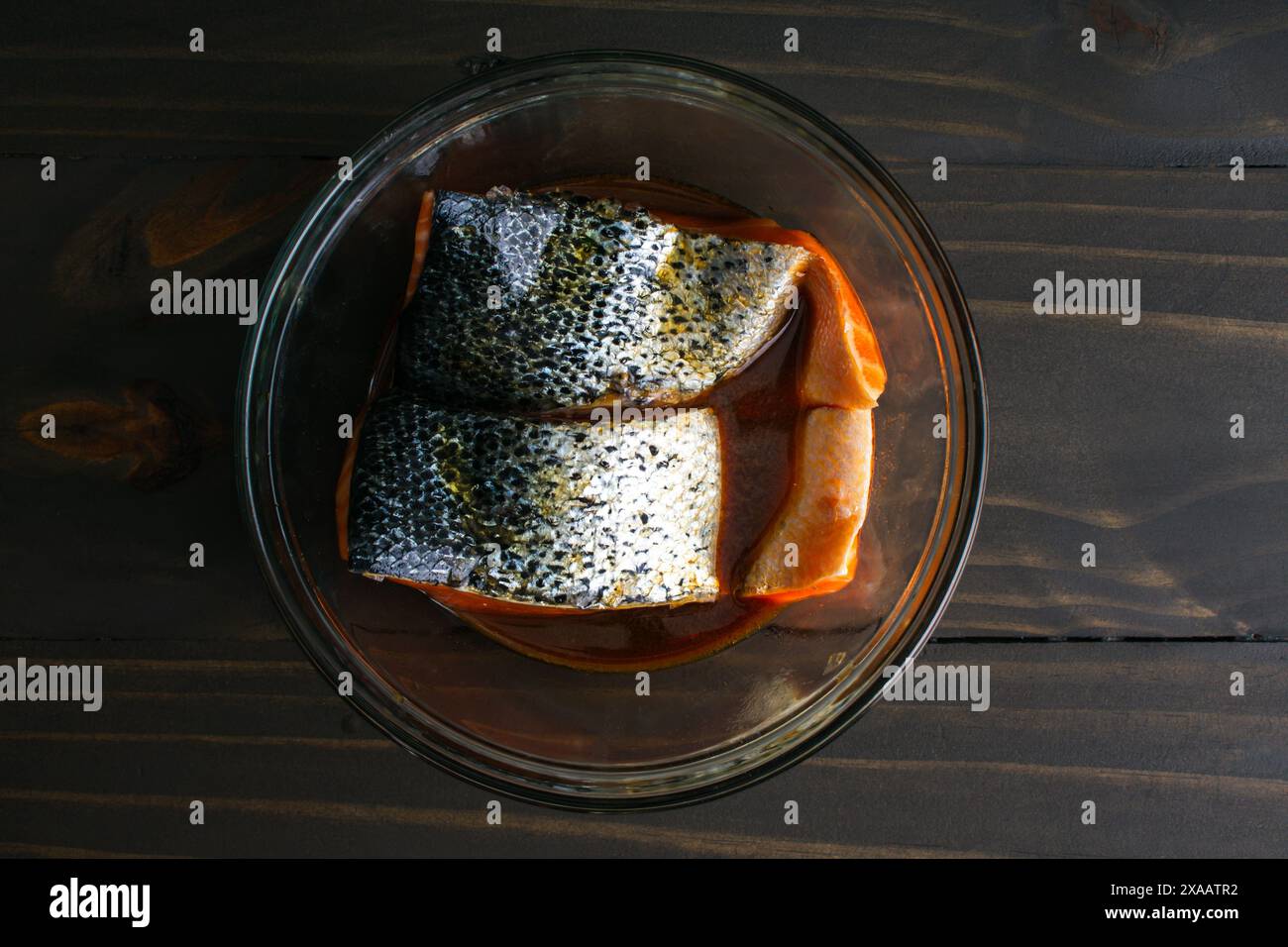 Marinating Salmon Fillets with Skin Side Up: Raw salmon fillets ...